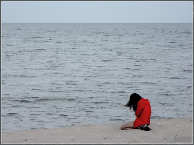 Sad Girl Alone In Beach